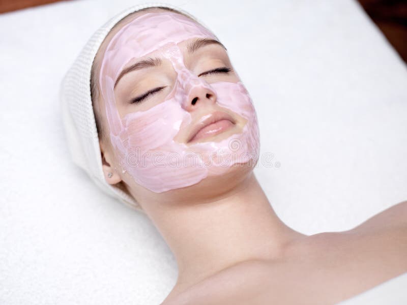 Woman with Pink Facial Mask Stock Photo - Image of pampering, pink ...