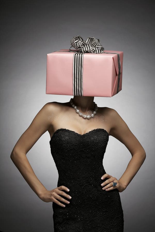 Woman with Pink Gift Box on Head Stock Photo - Image of modest, beauty ...