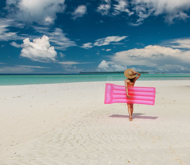 Woman with Pink Inflatable Raft at the Beach Stock Image - Image of ...