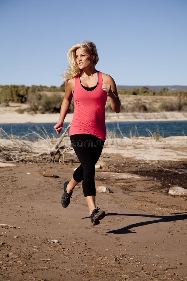 Smiling Running Woman stock photo. Image of fitness, latino - 145322