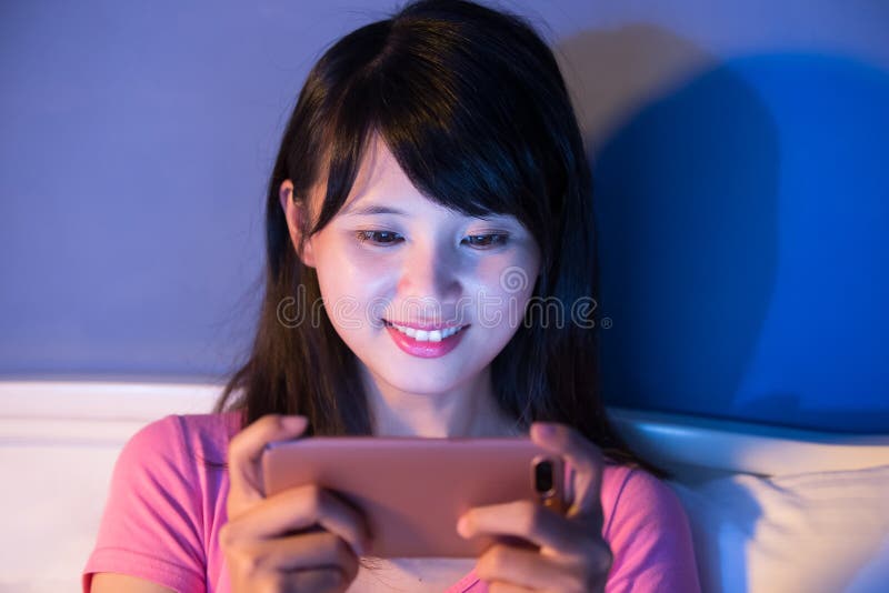 Woman play mobile game stock image. Image of phone, female - 127402401