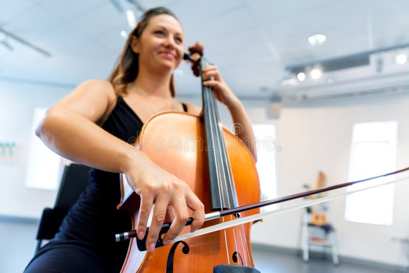 Woman playing cello stock photo. Image of person, classic - 106803894
