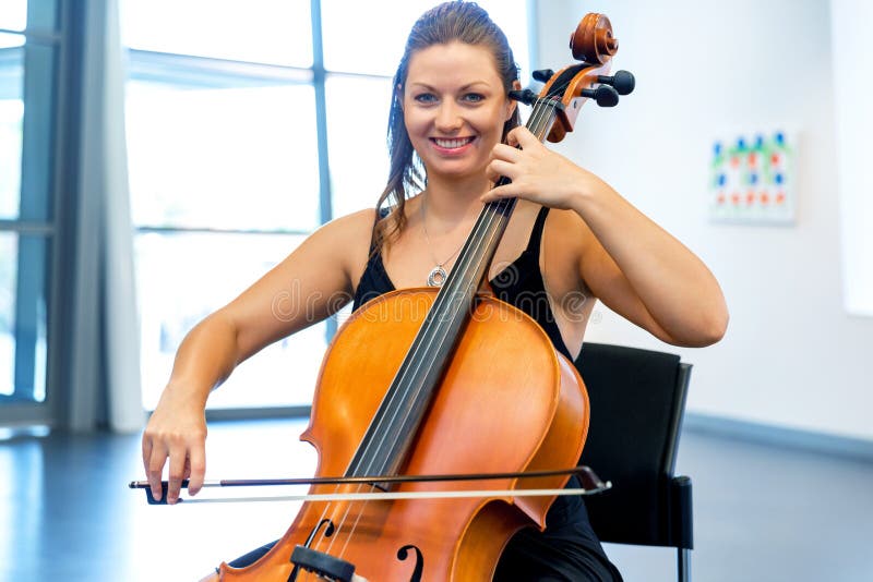 Woman playing cello stock photo. Image of player, symphony - 112324586