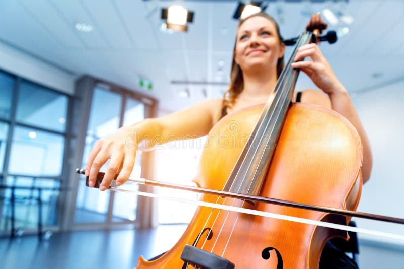 Woman playing cello stock photo. Image of musical, instrument - 133319724