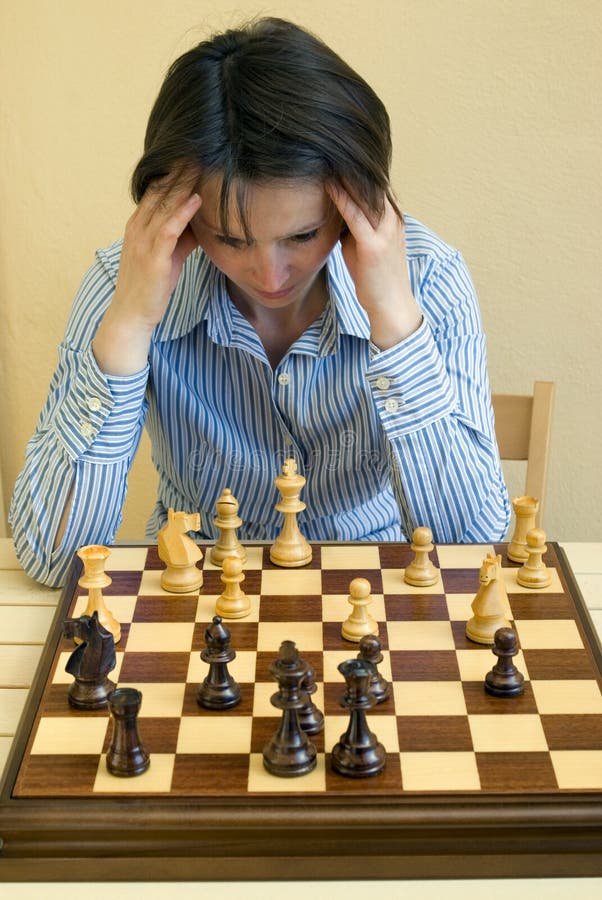 Woman playing chess stock photo. Image of attractive - 14602926