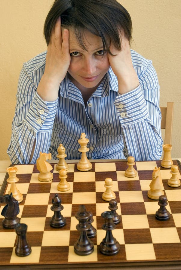 Young girl playing chess editorial photography. Image of education ...