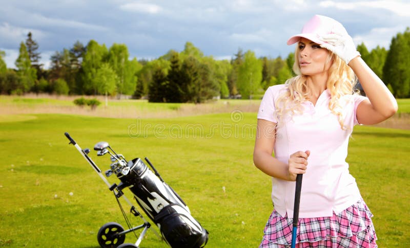 Woman playing golf stock image. Image of female, blond - 19610837