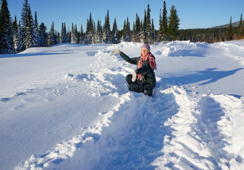 Woman Playing with Snow Up in a Sunny Afternoon. Stock Photo - Image of ...