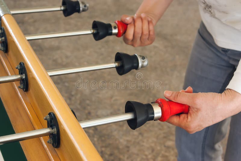 Woman playing table soccer stock photo. Image of activity - 60893682