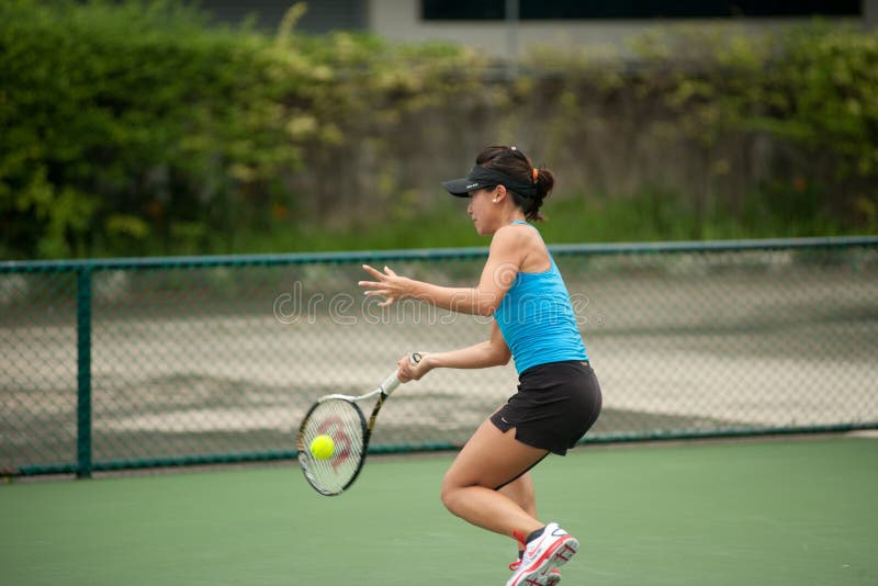 Woman playing tennis . editorial photography. Image of match - 27969917