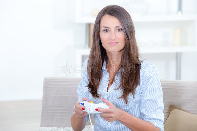 Woman playing video games stock photo. Image of copy - 122443192