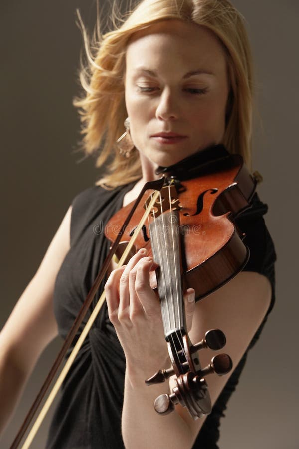 Woman Playing Violin Close Up Stock Photo - Image of blonde, elegant ...