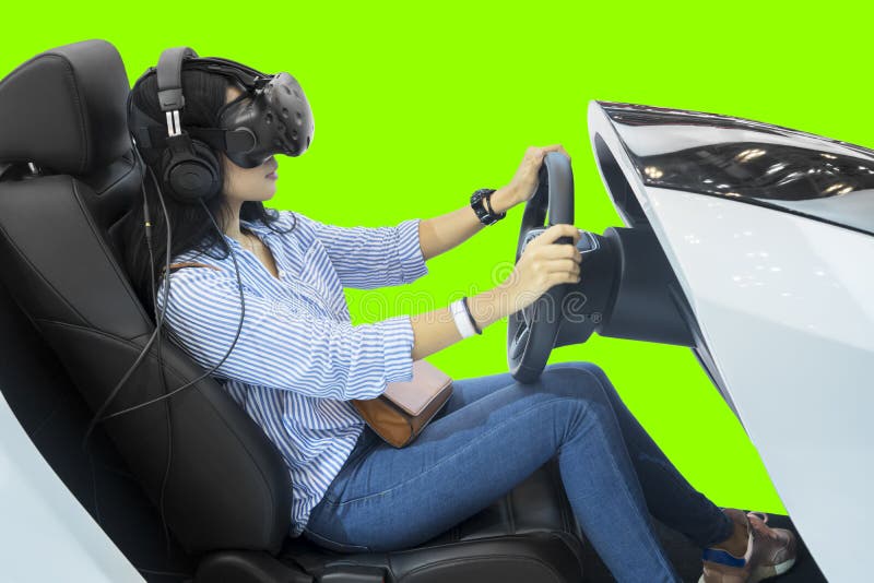 Woman Plays a Racing Game with a VR Glasses Stock Photo - Image of ...
