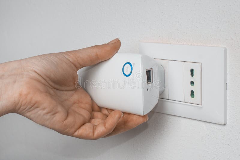 Woman Plug a Wifi Repeater on a Wall Plug Stock Photo - Image of white ...