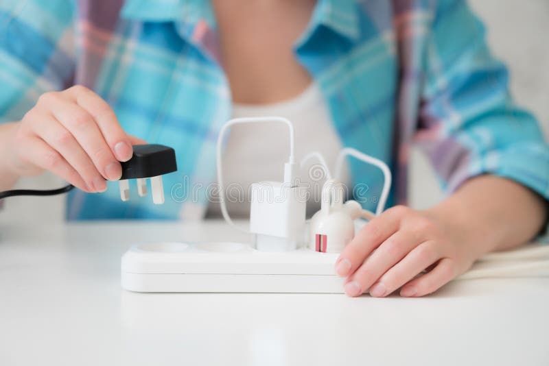 Woman Pluging the Wire. Power Supply in the House Stock Image - Image ...