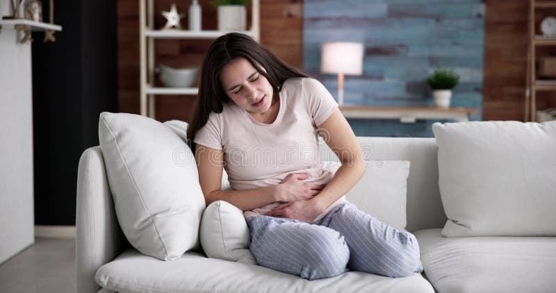 Woman with PMS stock photo. Image of stomachache, pressure - 267089510
