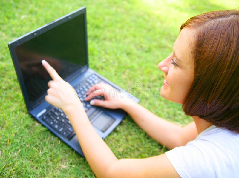 Woman Pointing at Computer Screen Stock Image - Image of informal, type ...