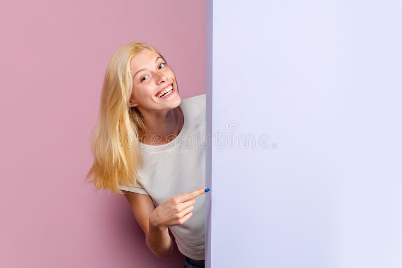 Woman Pointing Finger on Blank Board. Woman Standing Behind the Banner ...