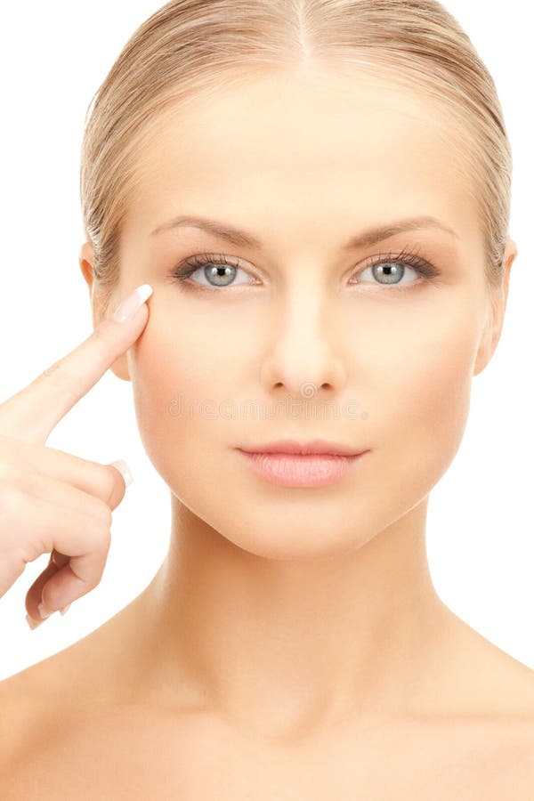 Woman Pointing at Her Eye Area Stock Photo - Image of clean, antiaging ...