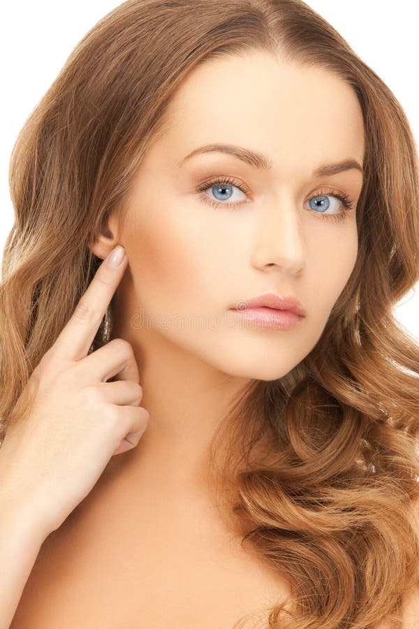 Woman pointing at her face stock image. Image of clean - 38096283