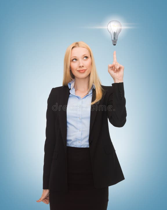 Woman Pointing at Light Bulb Stock Photo - Image of mind, electricity ...