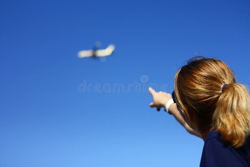 Woman Pointing Towards the Blue Sky Stock Image - Image of outstretched ...