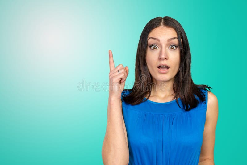 Woman pointing up stock photo. Image of smile, studio - 70232608