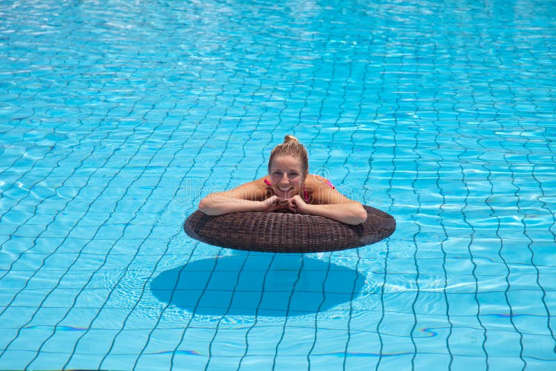 Relaxing in pool stock photo. Image of woman, relaxing - 14208624
