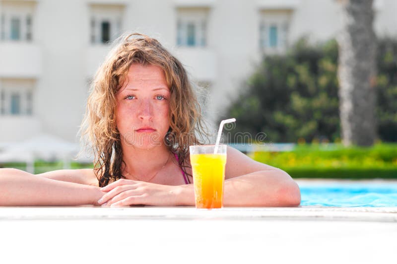 Woman at poolside stock image. Image of hair, beach, holiday - 19453367