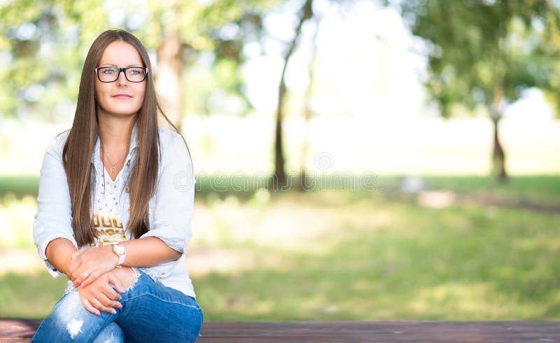 Woman Portrait Sitted on Bench Stock Photo - Image of banch, face ...