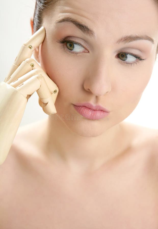 Woman Portrait Thinking with Mannequin Hand Stock Image - Image of ...