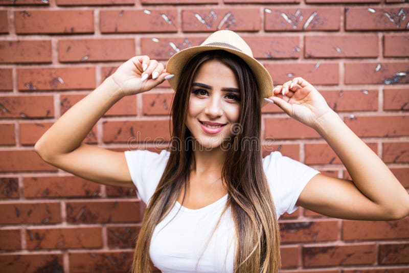 Woman Posing In Front Of Brick Wall Backround Stock Image Image Of