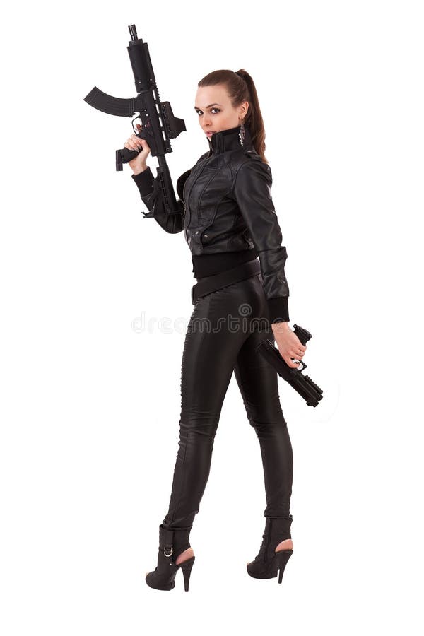 Woman posing with a guns stock photo. Image of agent - 23557204