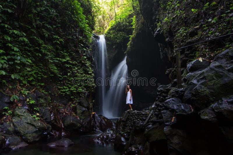 Woman Posing Near Gitgit Waterfall on Bali in Indonesia Stock Photo ...