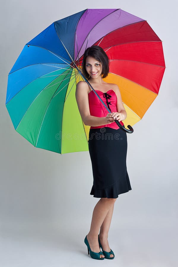 Woman Posing with Rainbow Umbrella Stock Photo - Image of pretty ...