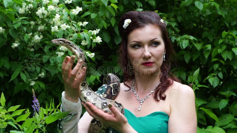 Woman Posing with a Snake Around Her Neck Stock Footage - Video of ...