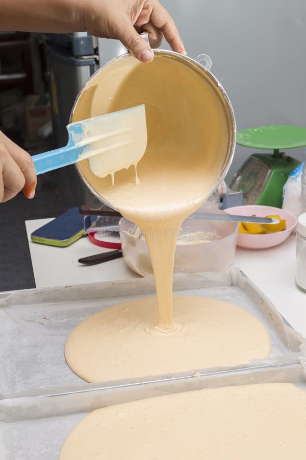 Woman is Pouring Dough into a Baking Tray. Stock Image - Image of ...