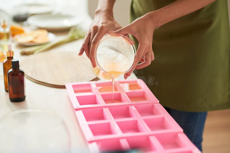 Woman Pouring Soap in Forms Stock Image - Image of apron, lifestyles ...
