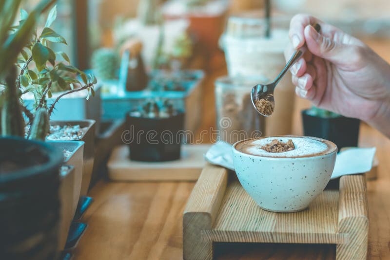 Woman Pouring Sugar into a White Cup of Coffe Stock Image - Image of ... Woman Pouring Sugar into a White Cup of Coffe Stock Image - Image of ...