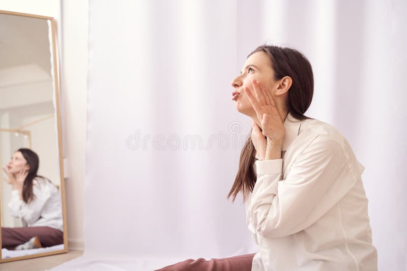 Woman Practicing Affirmations in Front of Mirror for Self-confidence ...