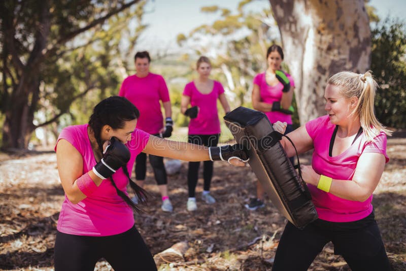 Woman Practicing Boxing in the Boot Camp Stock Image - Image of boxer ...