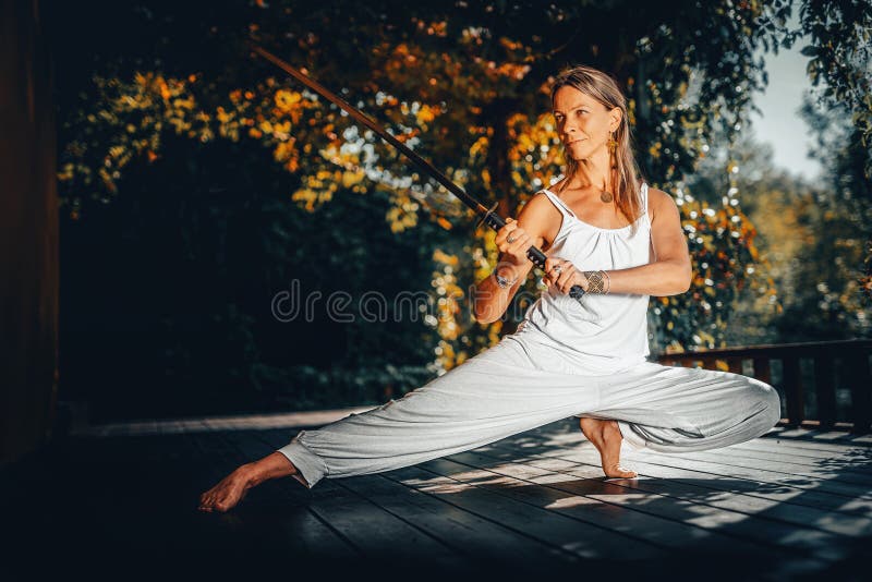 Woman Practicing with a Sword. Stock Image - Image of adventure ...