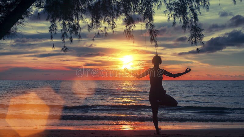 Woman Practicing Yoga on the Beach at Amazing Sunset. Stock Image ...