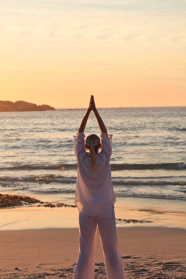 Woman Practicing Yoga during the Sunset Stock Photo - Image of ...