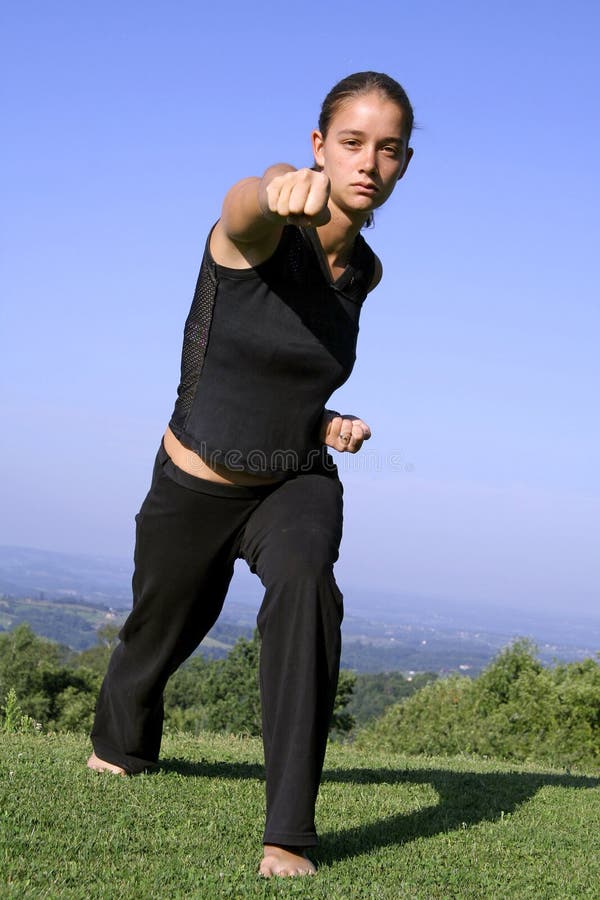 Woman Practising Self Defense Stock Photo - Image of foot, punch: 3204632