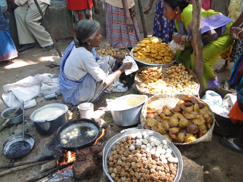 Woman prepares fried food editorial photo. Image of cooking - 12291816