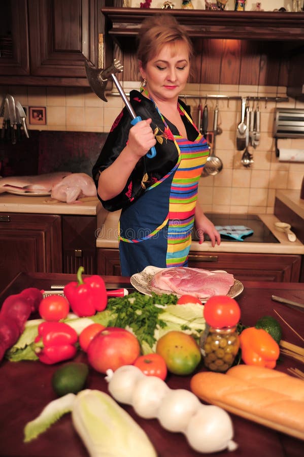 Woman Prepares the Meat in the Kitchen Stock Image - Image of garlic ...