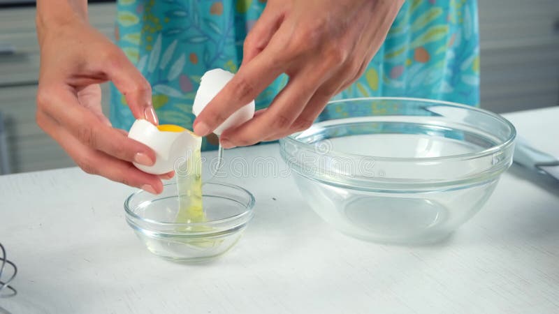 Woman Preparing Dish Breaking Cracking Egg into Transparent Bowl on ...