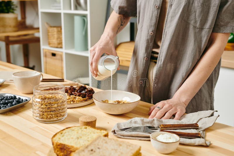 Woman Preparing Food on a Table in the Morning Stock Photo - Image of ...