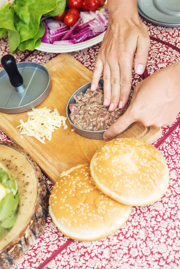 Kid making hamburger stock image. Image of hamburger - 70603633